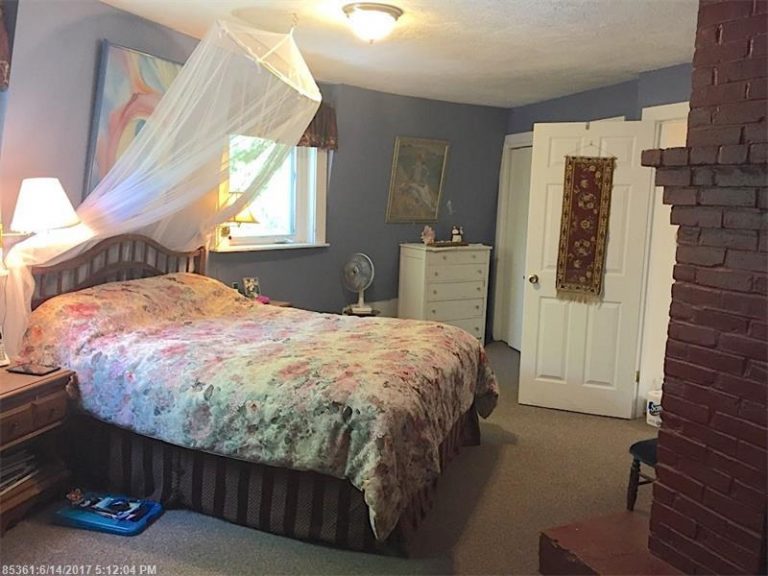 Lighthouse Style Home Has Curved Kitchen in Durham Maine