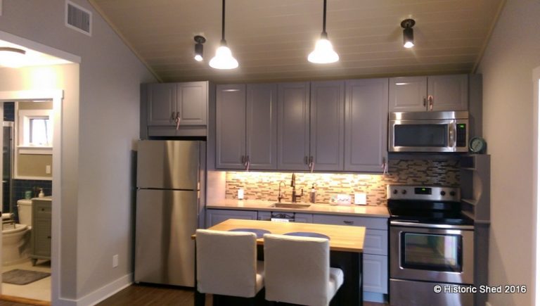 A Tangerine Carriage House Designed by Historic Shed