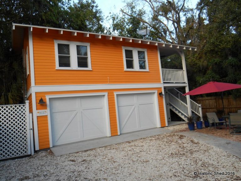 A Tangerine Carriage House Designed by Historic Shed