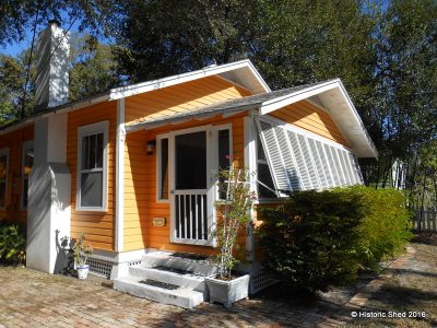 A Tangerine Carriage House Designed by Historic Shed